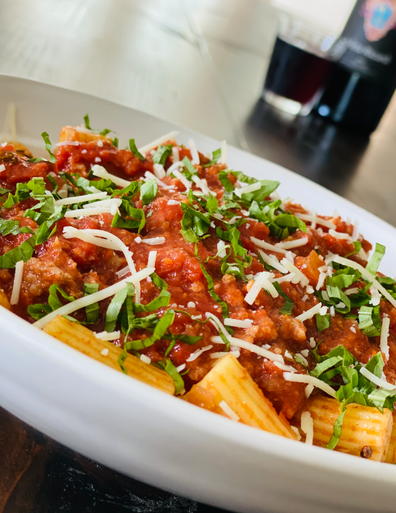 Bolognese with Rigatoni, Fresh Basil and Grated Cheese - Concetta's ...
